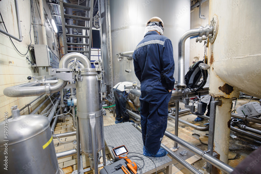 Male work inspection process stainless steel tanks and pipe with ...
