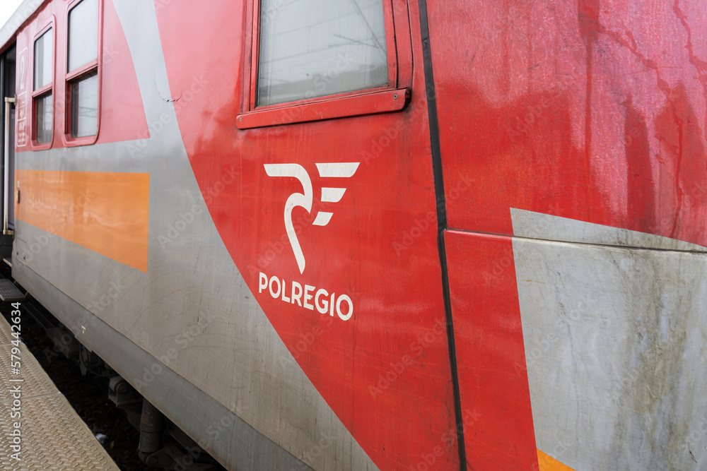 Polregio logo sign, on the side of PKP class EN57 train. Polish ...