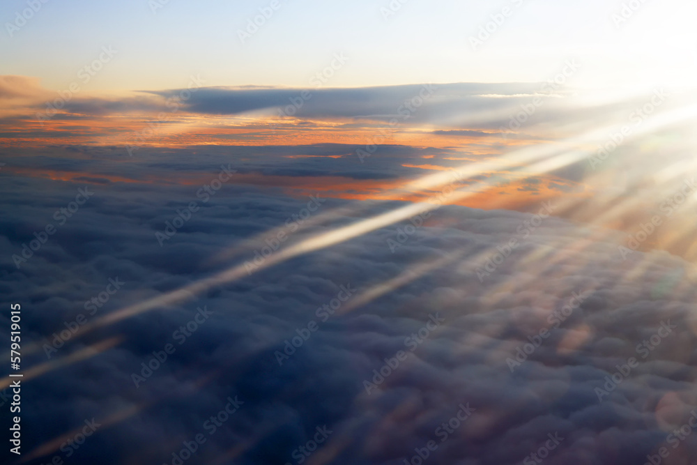 Heaven with sun light rays or beams bursting from clouds in blue sky ...