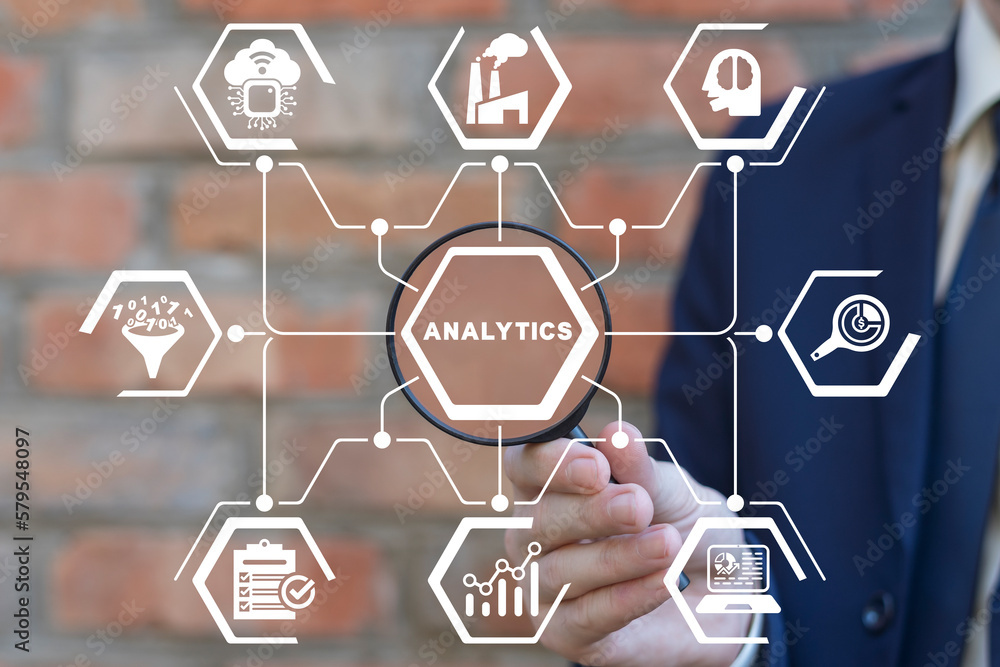 Businessman using virtual touchscreen presses word: ANALYTICS. Concept ...