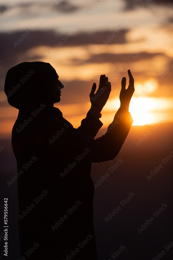 Muslim woman prayer having worship and praying with hands open doing ...