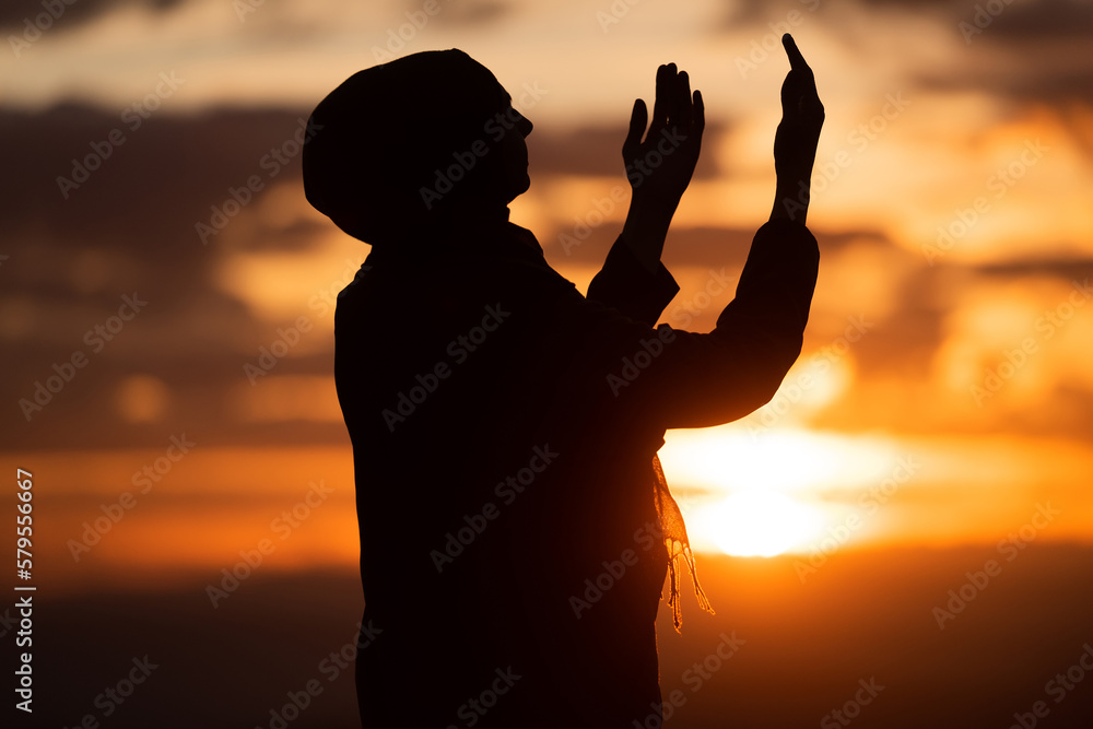 Muslim woman prayer having worship and praying with hands open doing ...