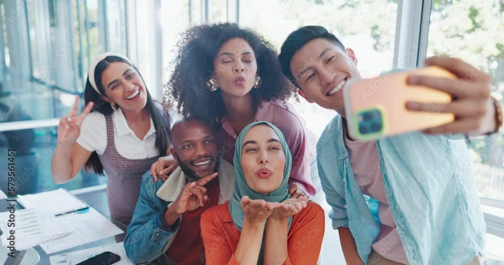 Phone, team building or happy employees take a selfie in an office room ...