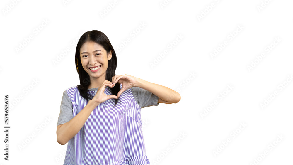 Asian young woman with bright smile making heart symbol shape with ...
