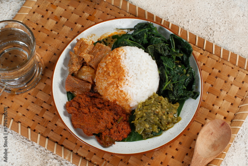 Nasi Padang with rendang is an Indonesian food from West Sumatra in ...