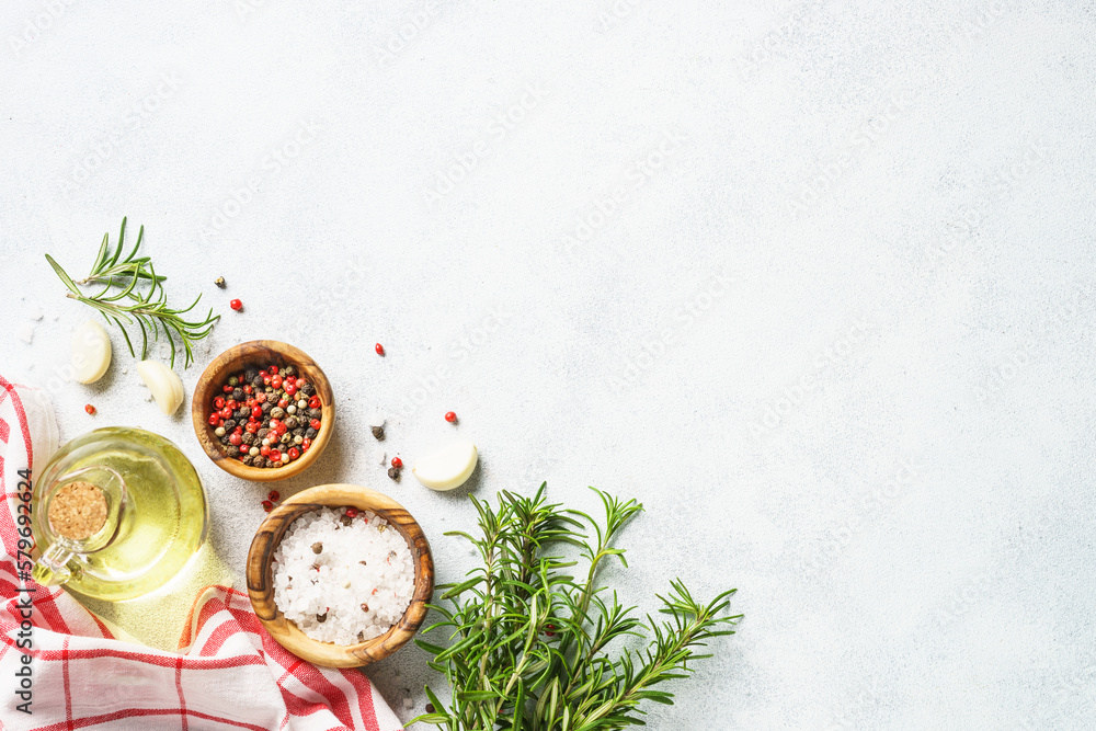 Ingredients for cooking on white kitchen table. Herbs, spices and ...