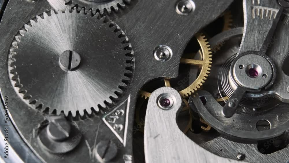 Clock mechanism rotates close-up. The working mechanism of round ...
