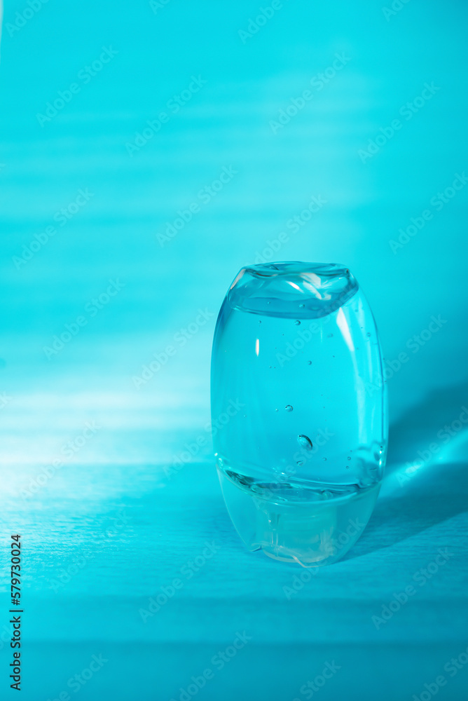 Pocket antiseptic hand sanitizer gel isolated on blue background, no ...