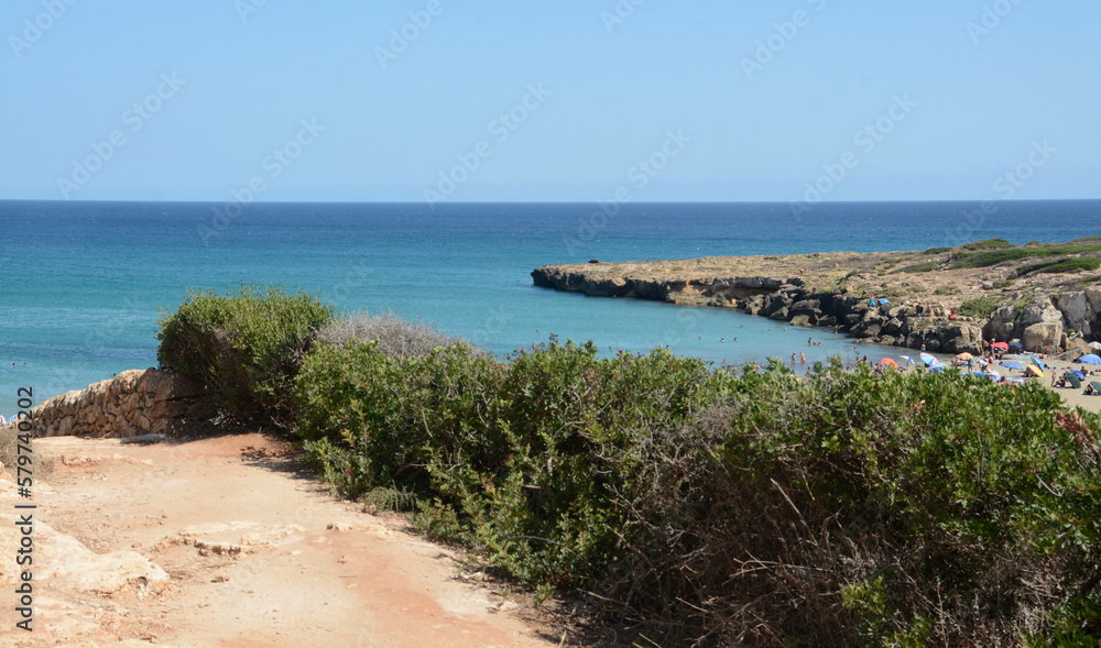 Calamosche beach is located between the archaeological remains of Eloro ...