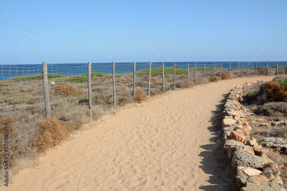 Foto Stock Calamosche beach is located between the archaeological ...