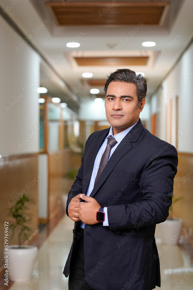 Indian businessman wearing suit and giving expression. Stock Photo ...