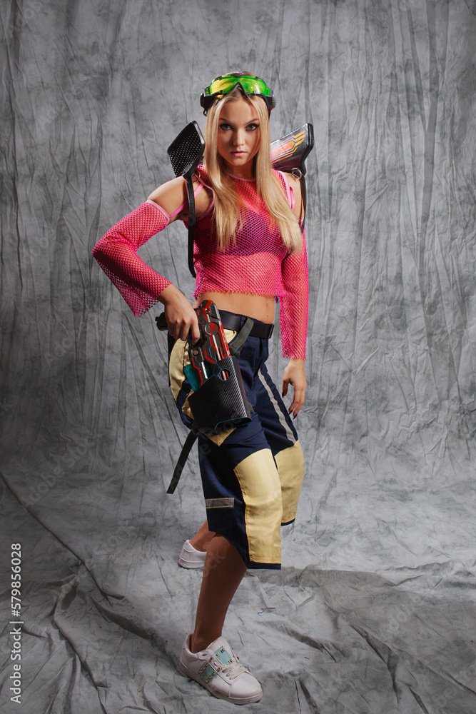 Cyber thug with a laser gun, a bold and bright blonde in a futuristic ...