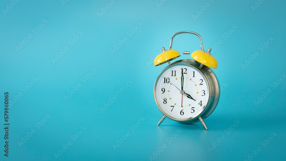 Retro silver alarm clock. 4:00, am, pm. Blue background. Stock Photo ...