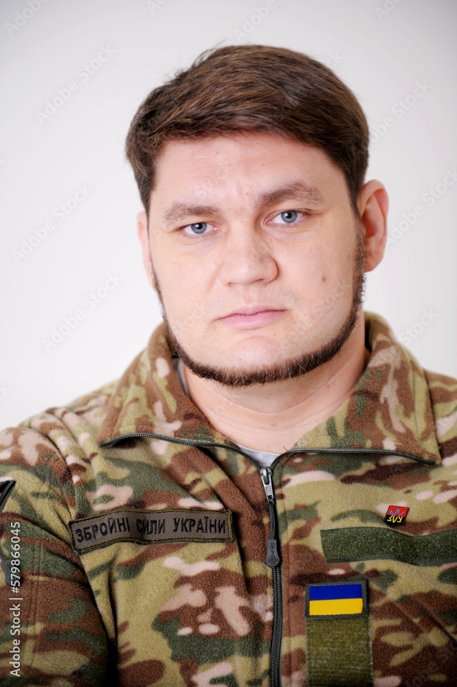 Ukrainian defender. soldier Armed Forces of Ukraine. A close-up photo ...