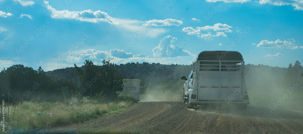 horse trailer travelling down highway blue sky background yellow ...