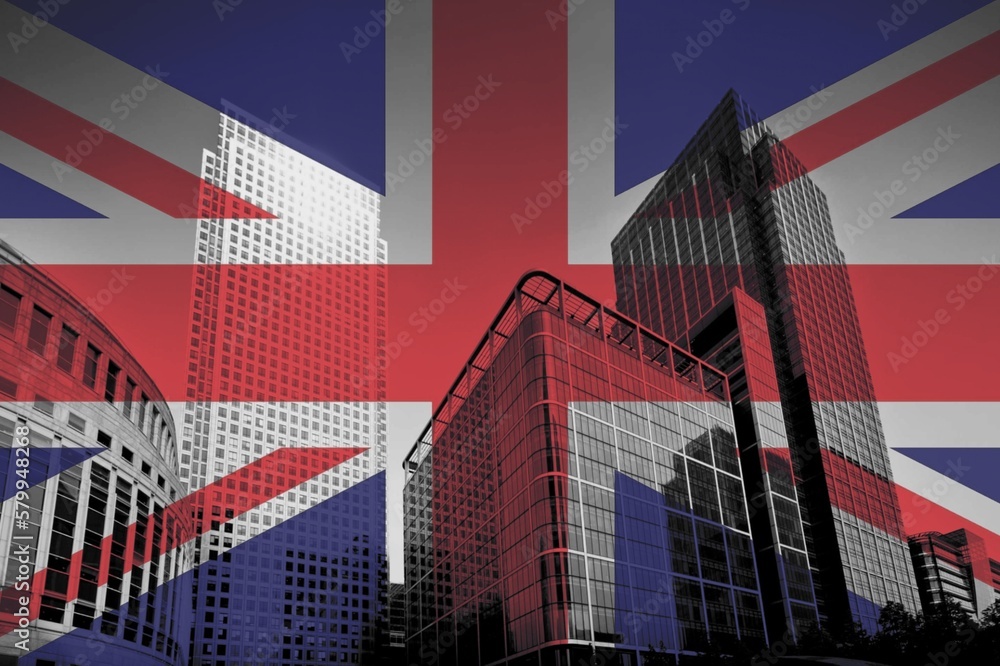 UK Flag with the background of buildings and infrastructure. Various ...