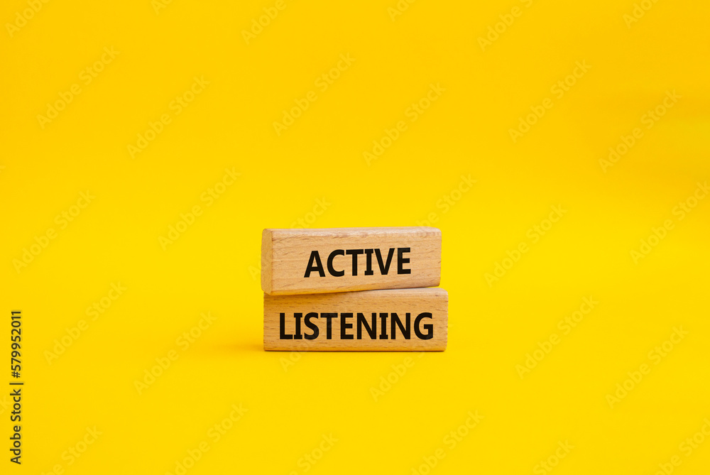 Active listening symbol. Wooden blocks with words Active listening ...