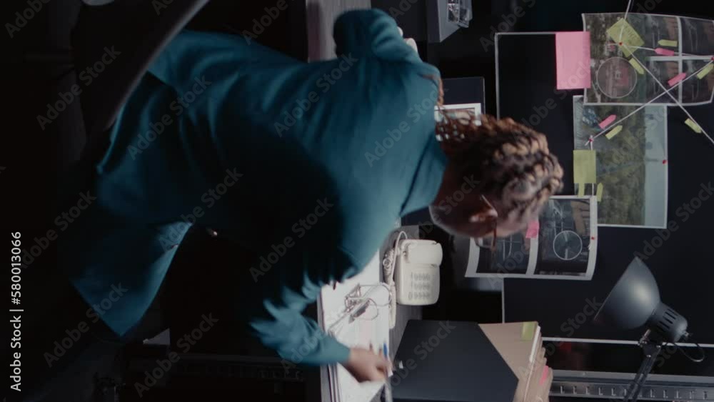 Vertical video: Private agency detective conducting investigation with ...