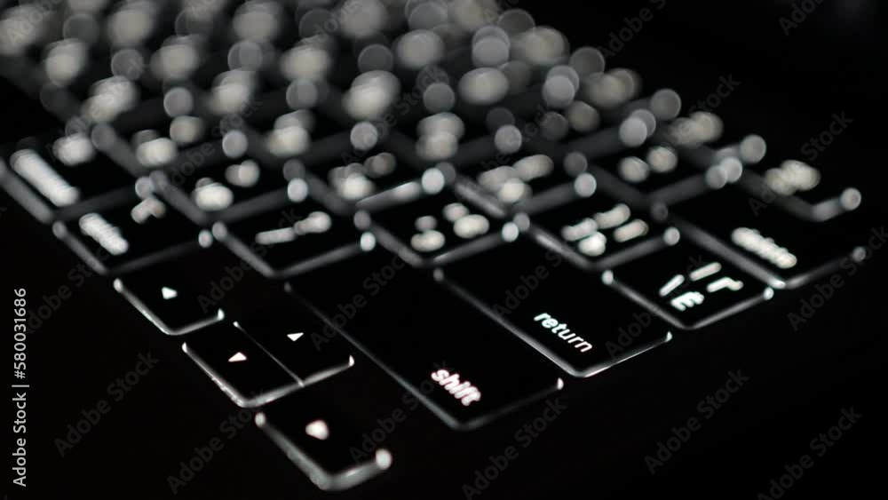 Stockvideon Close up of laptop keyboard backlight, backlit keyboard ...