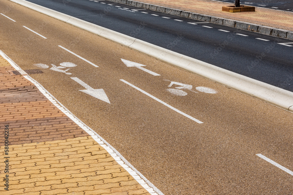 A two way, dedicated cycle way has created and is shown by clear ...