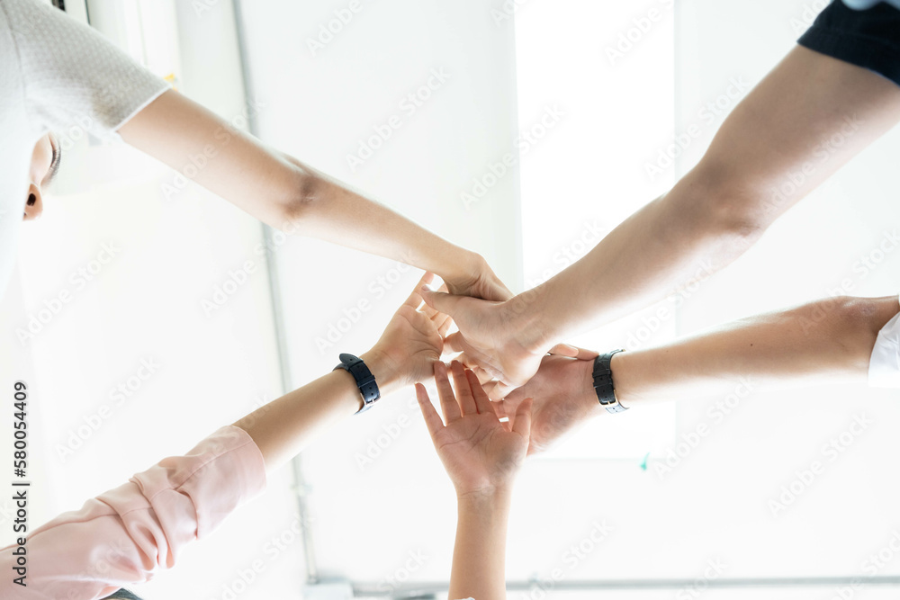 holding hands for strong teamwork and volunteer to public service ...