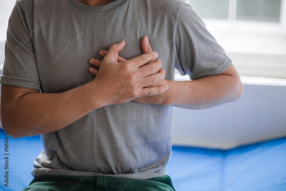 heart attack problem The young man was suffering from severe chest pain ...