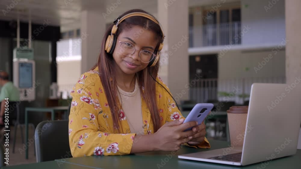 Video young black African college student learning online using cell ...