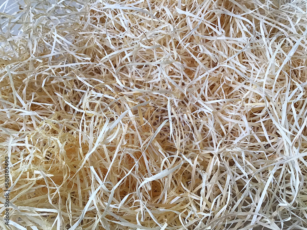 Decorative straw, filler, shavings for box. Top view, mockup for design ...