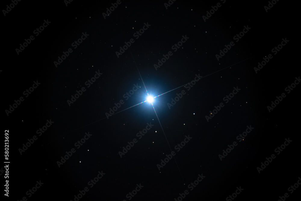Poster Night sky background with bright Sirius star on black sky with ...