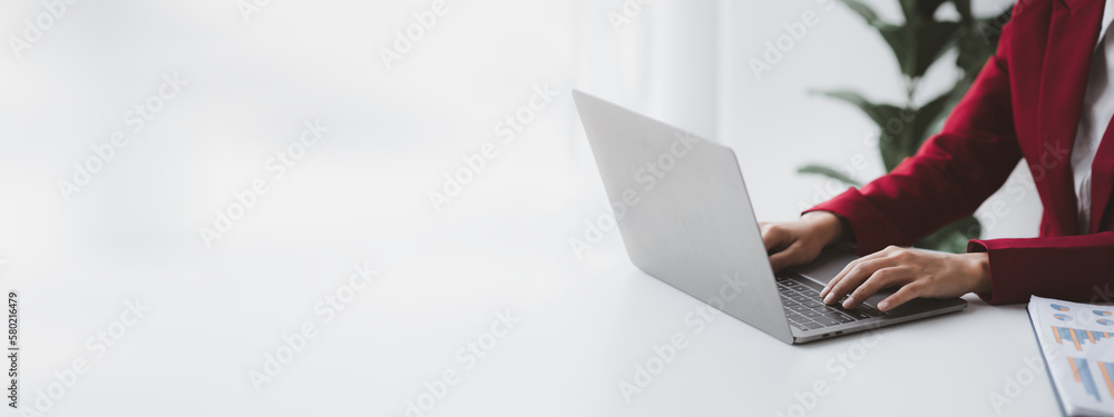 Person typing on laptop keyboard, businessman working on laptop, he is ...