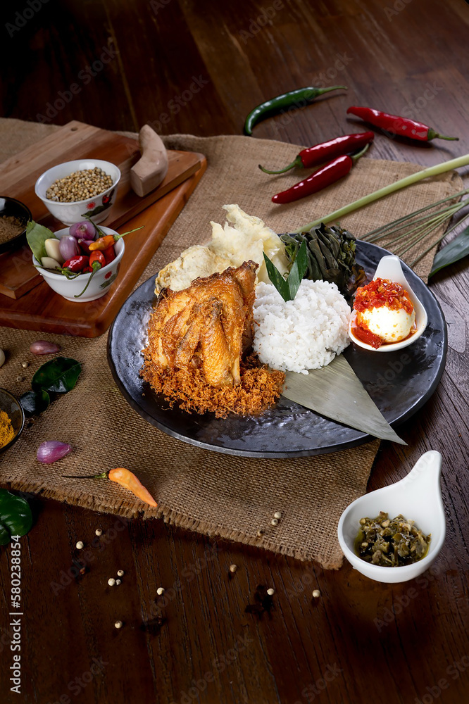 Ayam goreng kremes or Crispy fried chicken with spicy chilli sauce or ...