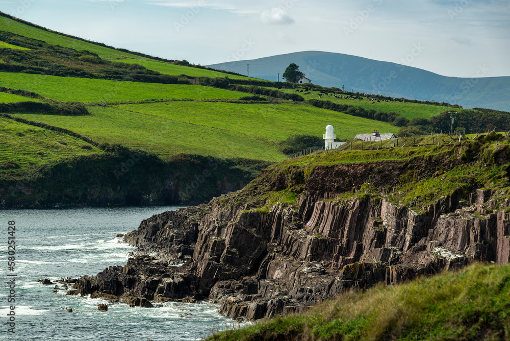 Beautiful cliffs and rocky coast at Dingle lighthouse, Dingle Peninsula ...