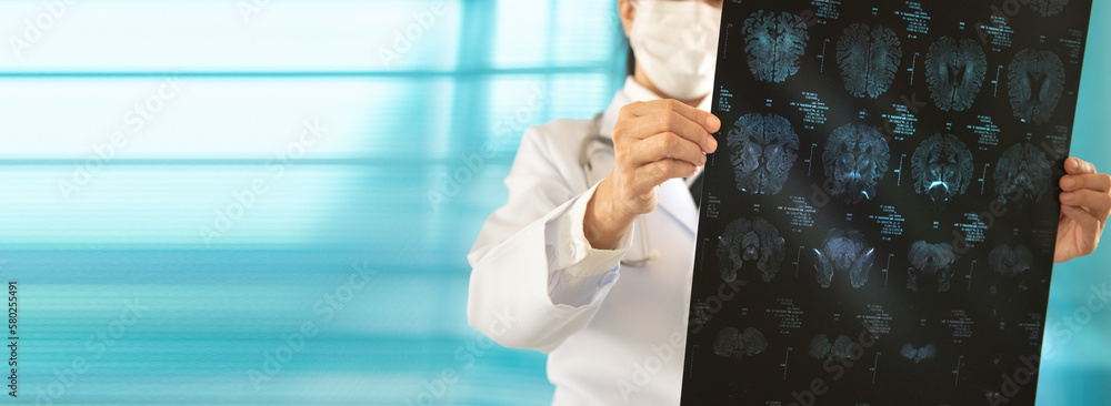 Doctor radiology check up brain x-ray film by ct scan brain and mri ...