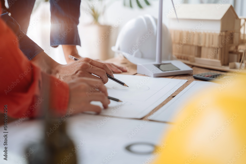 Person's engineer Hand Drawing Plan On Blue Print with architect ...