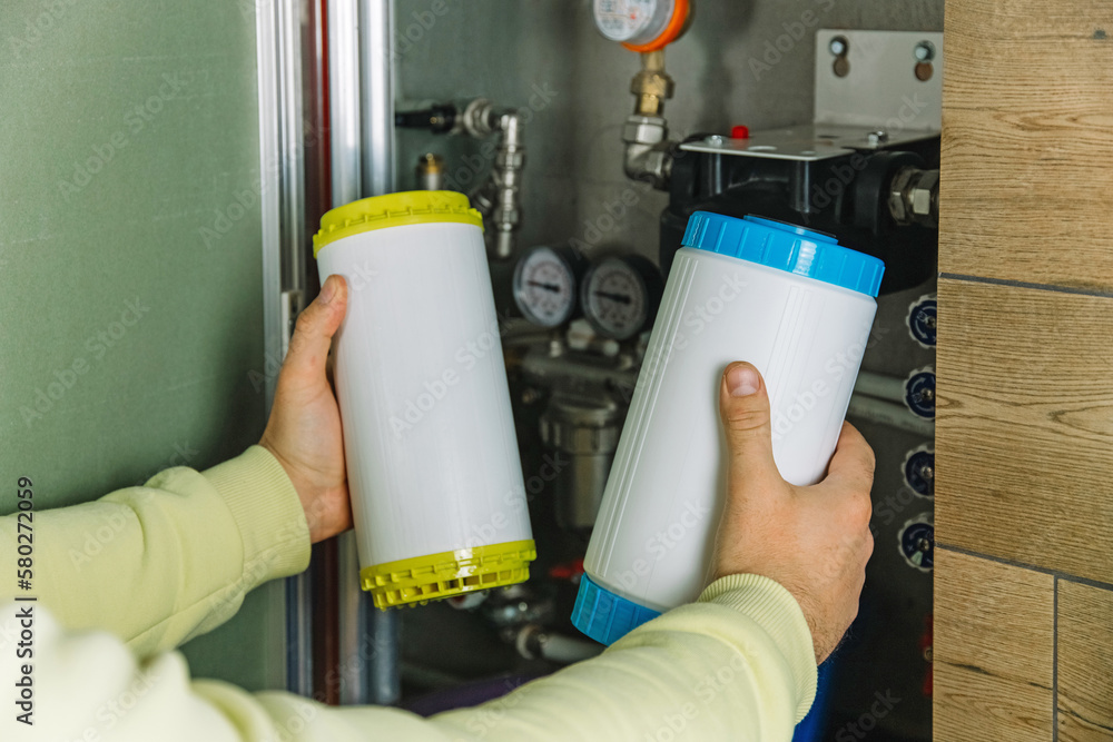 Replacing the filter element in the home water purification system ...