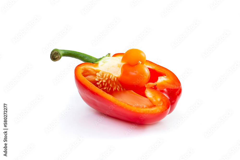 baby bell pepper inside a cross sectioned pepper, Stock Photo | Adobe Stock