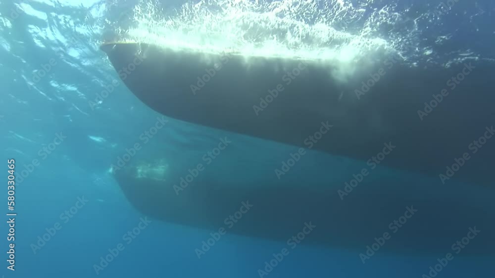 Stunning view of boat from under water. It is crucial that we take ...
