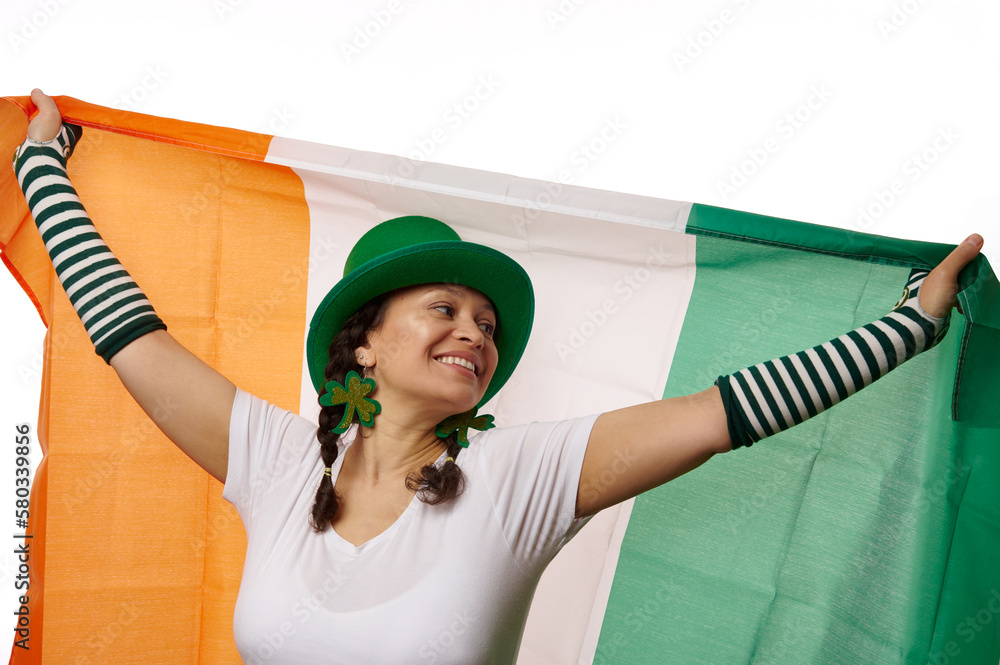 Charming Irish woman woman wearing green St Patrick's hat and clover ...