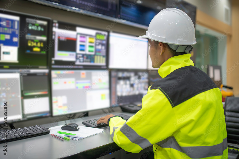 Engineer working at control room,Manager control system,Technician man ...