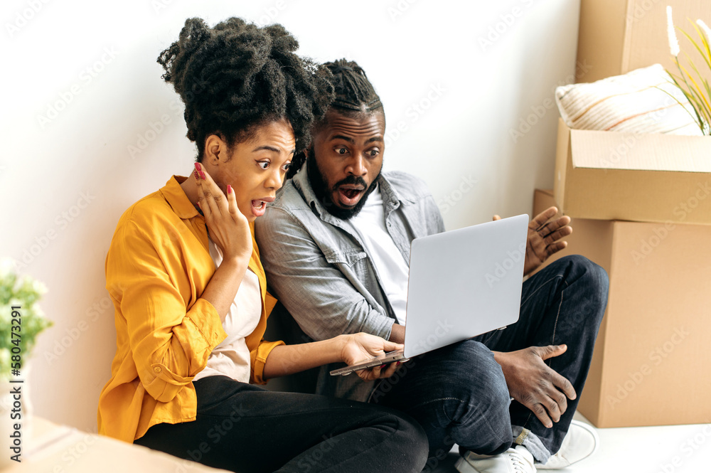 Shocked stunned african american married couple, dressed in casual wear ... Shocked stunned african american married couple, dressed in casual wear ...