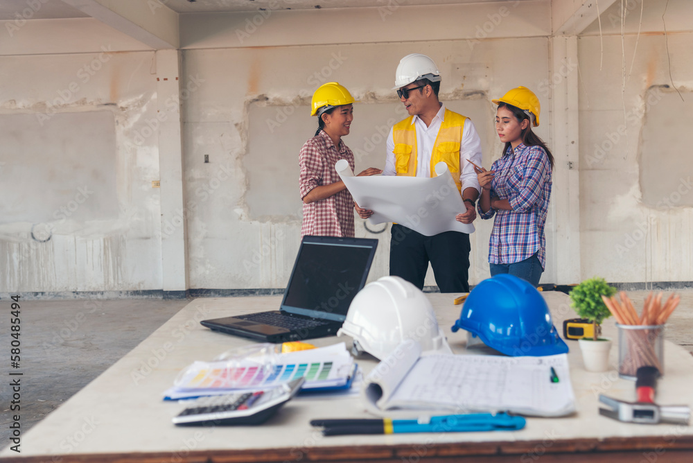 Civil construction engineer team meeting on construction site with ...