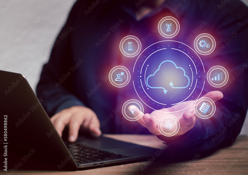cloud computing concept. Man using laptop using cloud technology ...