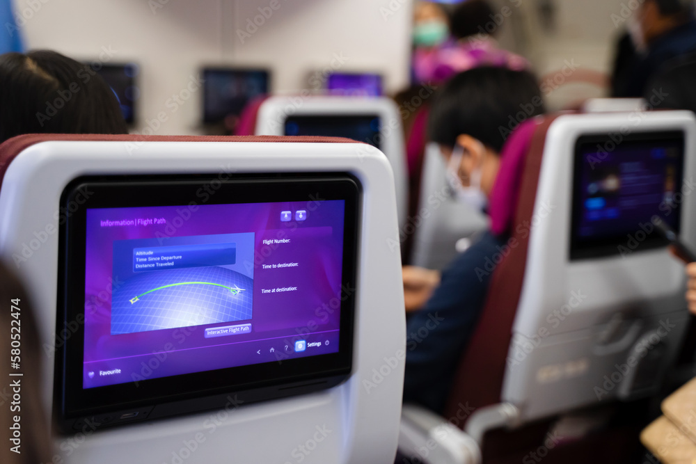 LCD display. Colorful flight maps on-screen inside passenger planes, a ...