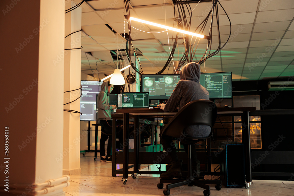 Young Hacker Cracking Firewall Encryption On Multi Monitors Writing Script And Programming