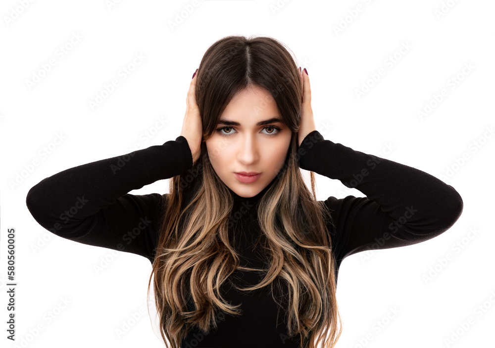 Portrait of serious twenty year old girl have closed ears with hand ...