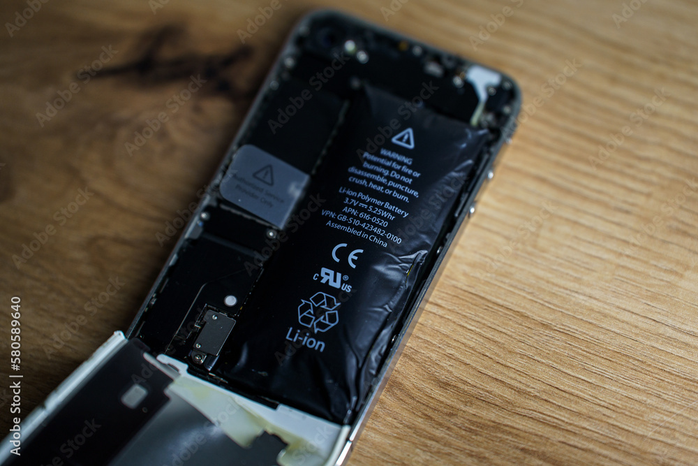 Iphone with exploded Lithium-ion battery. Li-ion swollen battery Stock ...