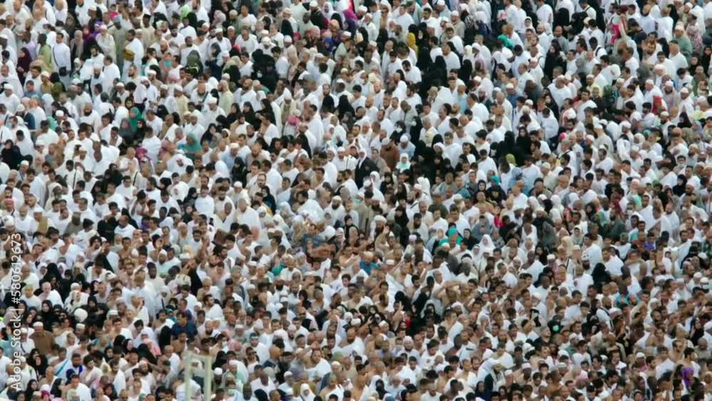 Thousands of Islam pilgrims surge around the Kaaba in Mecca. praying ...