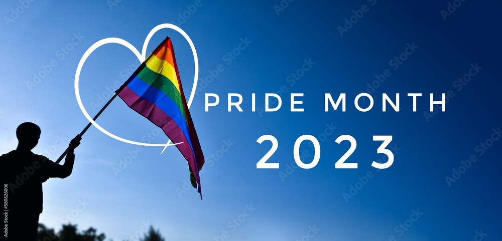 Pride Month 2023 on bluesky background with rainbow flag raising of ...