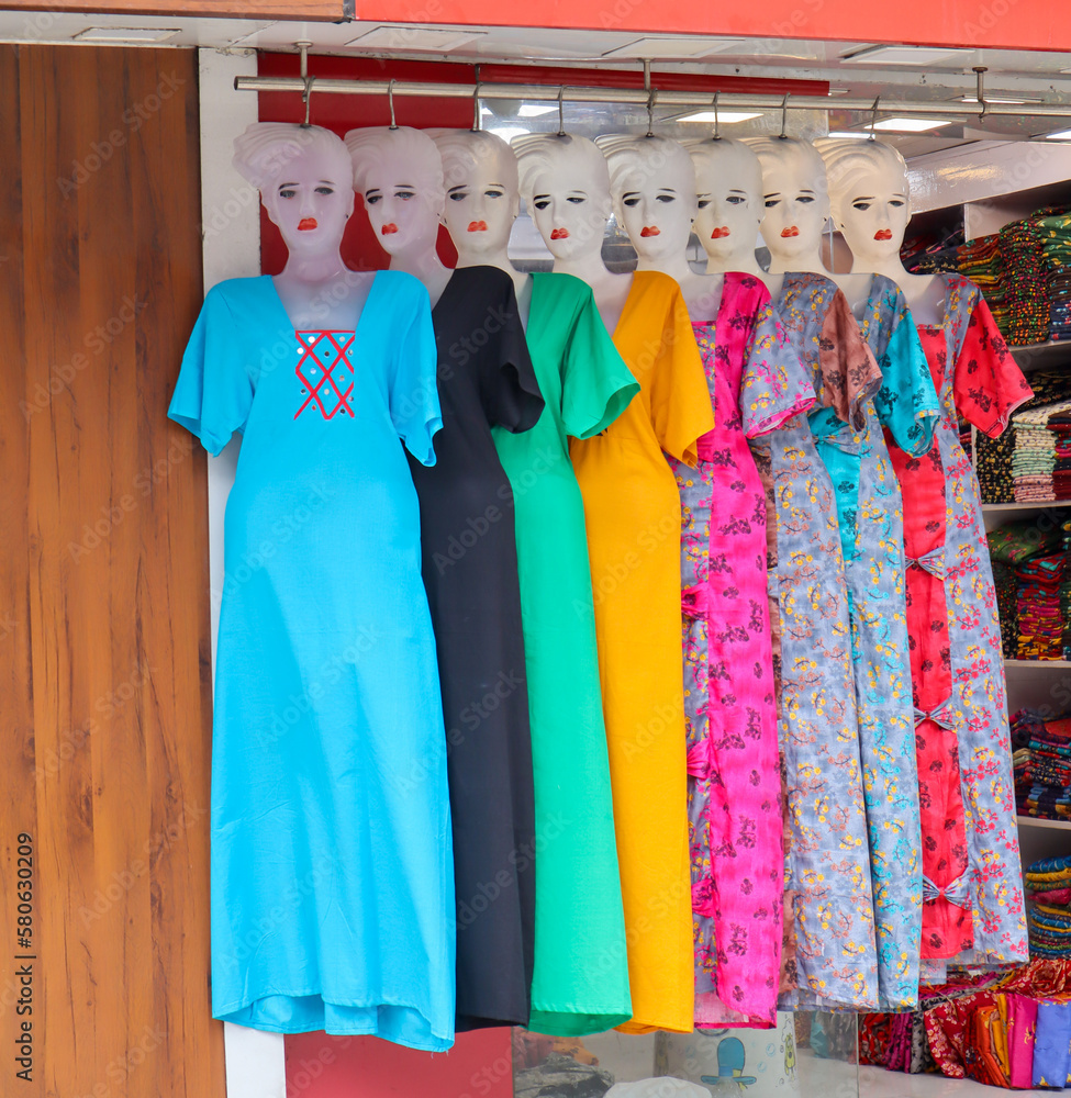 Colorful Kurtis or Salwar kameez which is a traditional dress code to ...