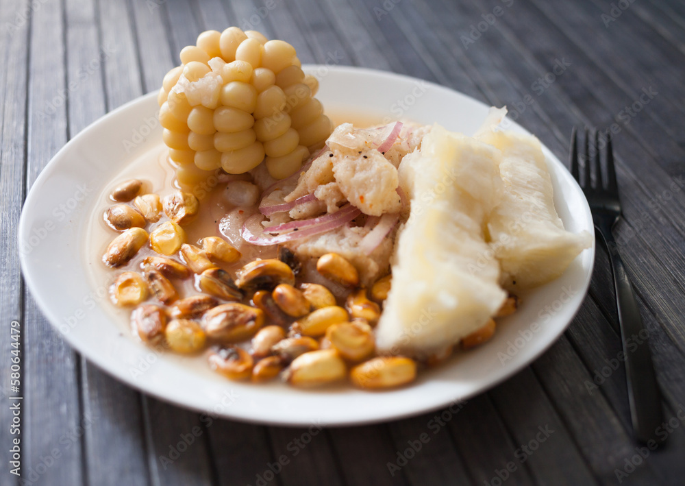 Peruvian traditional dish.fish ceviche with yuka and corn Stock Photo ...